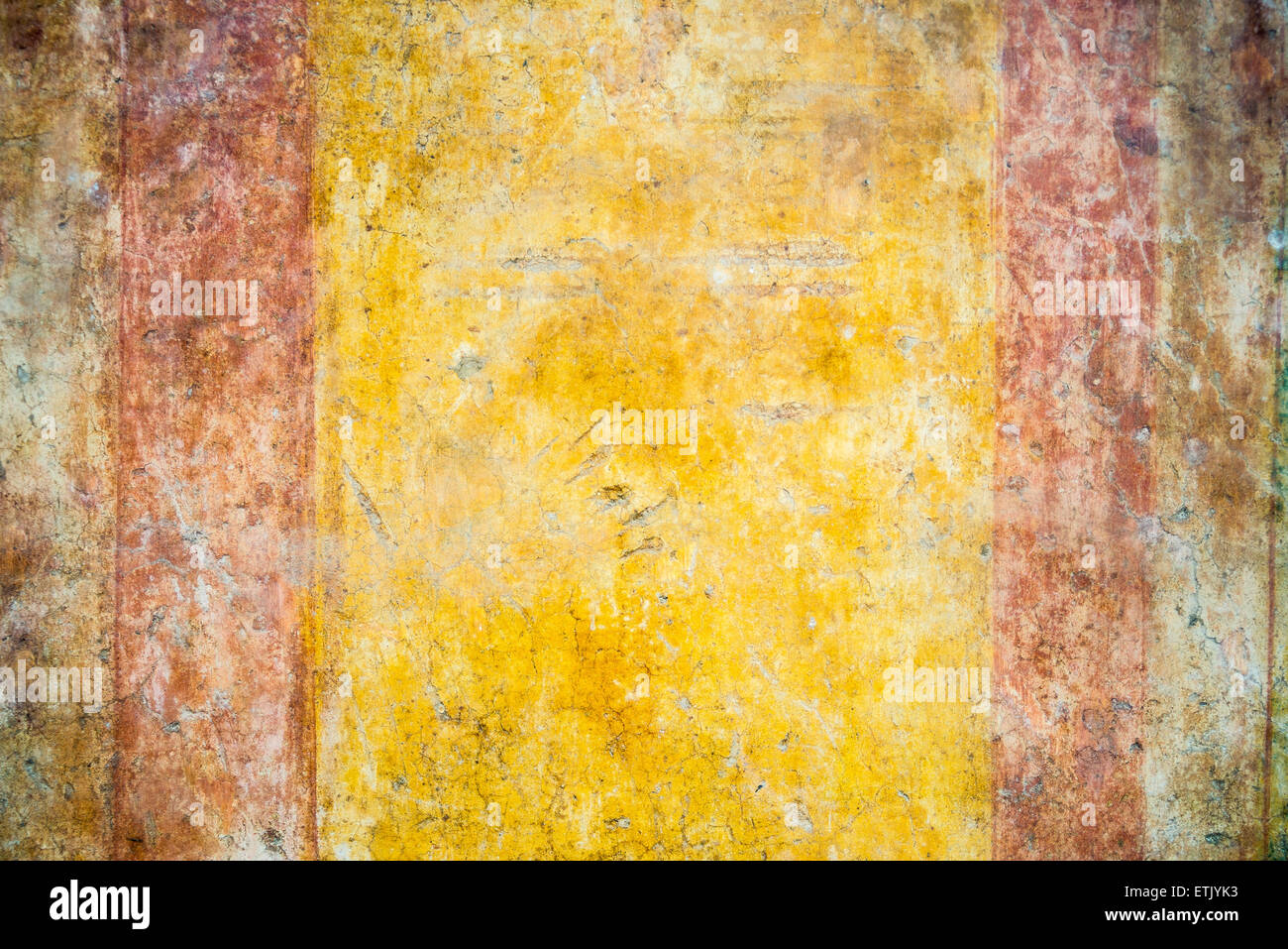 Details of an ancient roman plastered colorfully painted surface with ...