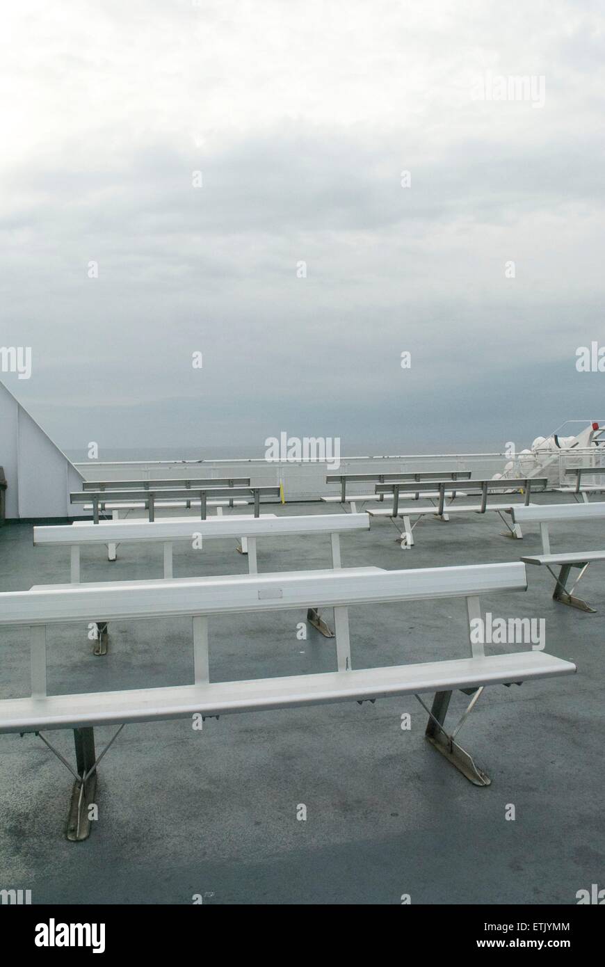 white benches on ferry to victoria Stock Photo - Alamy