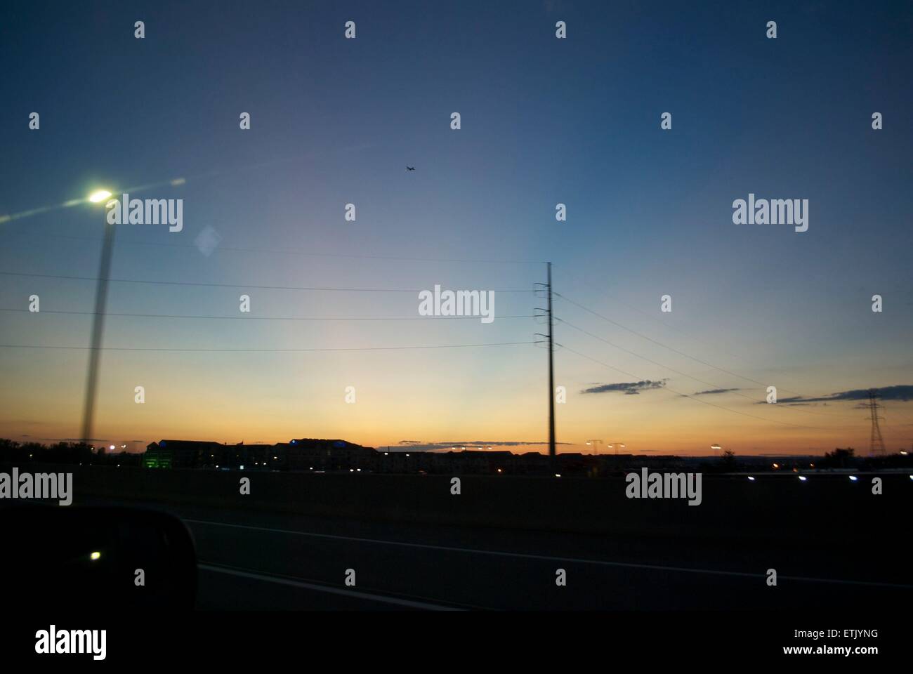 Electricity poles with sunset hi-res stock photography and images - Alamy