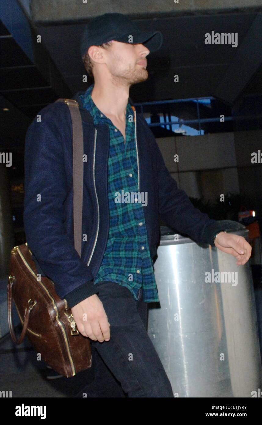 Theo James at Los Angeles International Airport (LAX) Featuring: Theo ...