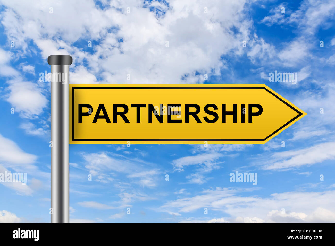partnership words on yellow road sign on blue sky Stock Photo - Alamy