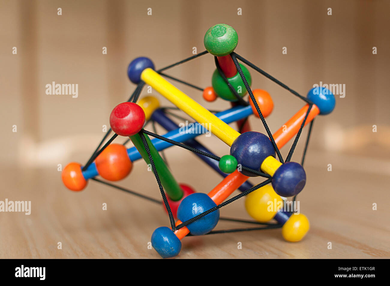 Children's toy made of wood and strings Stock Photo - Alamy