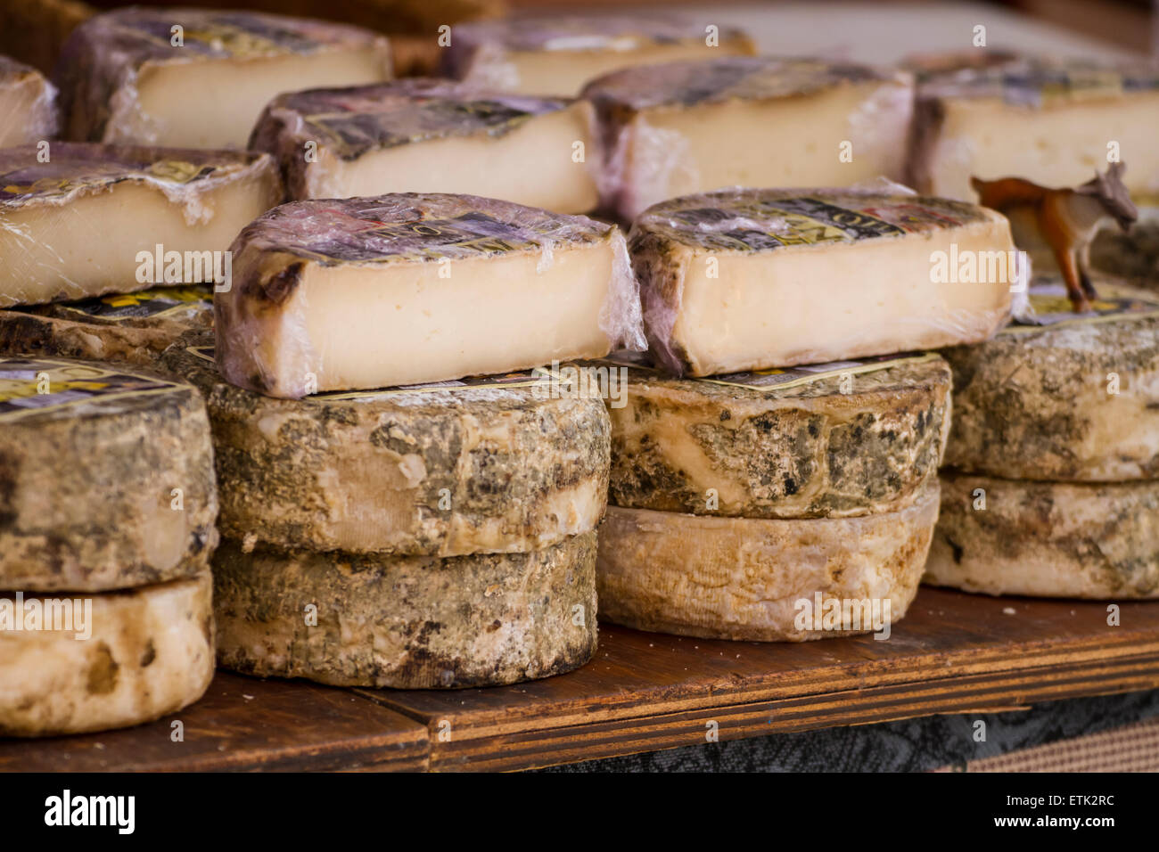 group of cheeses on a medieval fair in Spain Stock Photo - Alamy