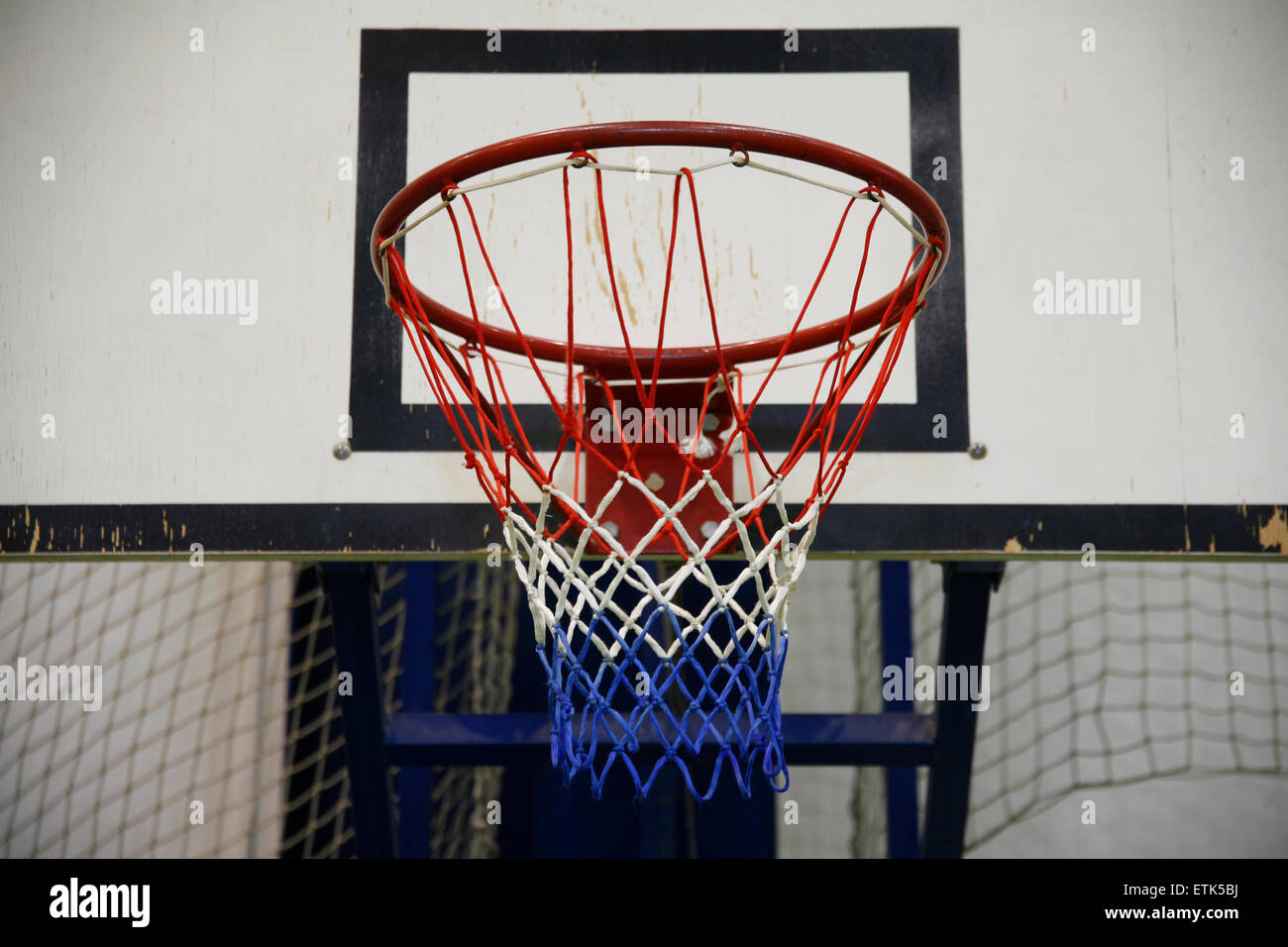 Basketball hoop in the high school gym Stock Photo - Alamy