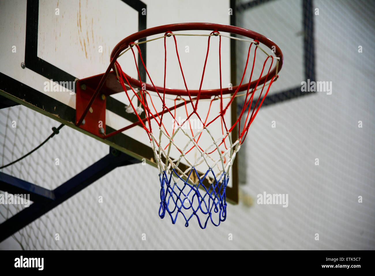 Basketball hoop in the high school gym Stock Photo - Alamy