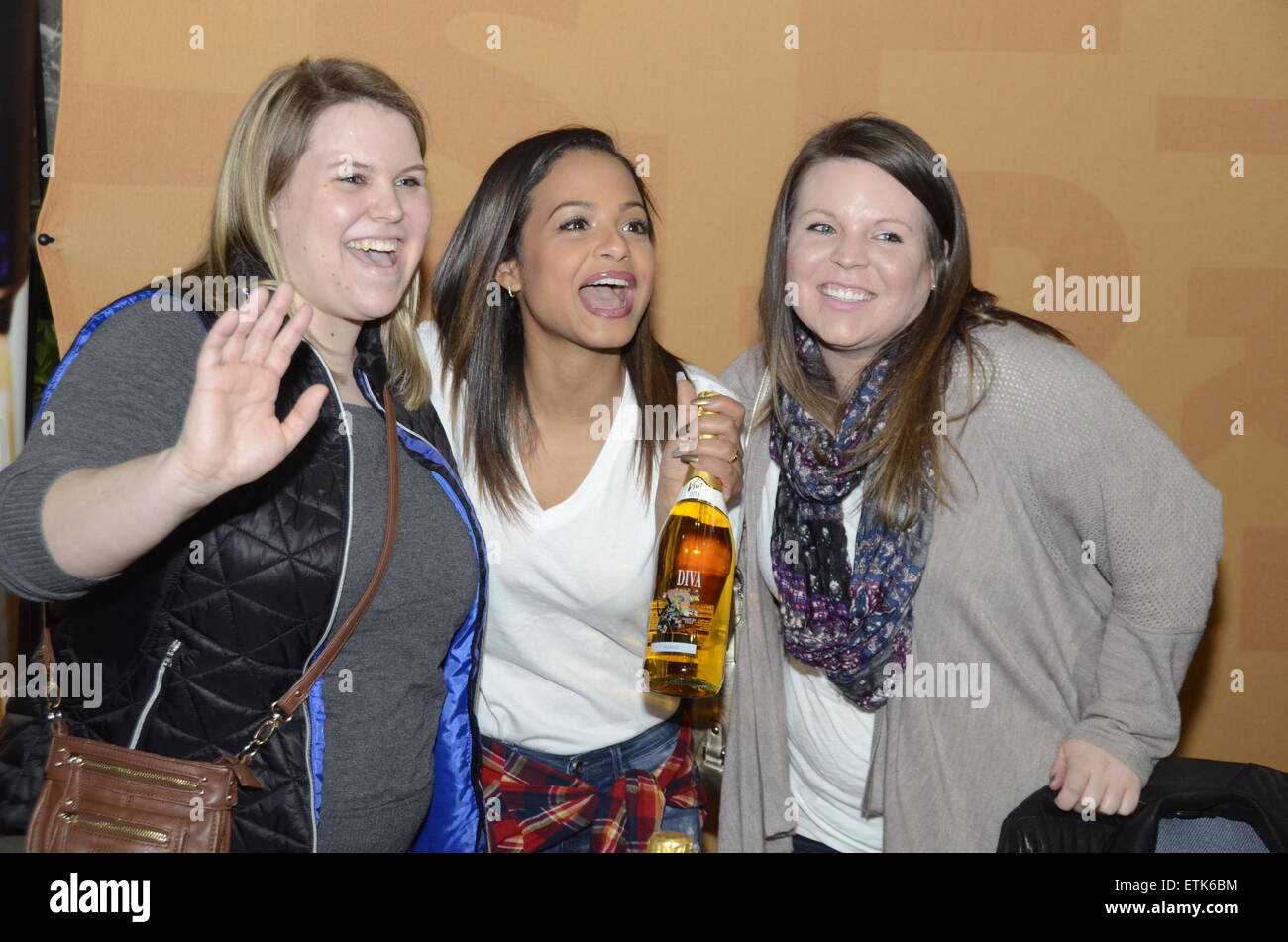 Christina Milian signs bottles of her Viva Diva wines at the ...