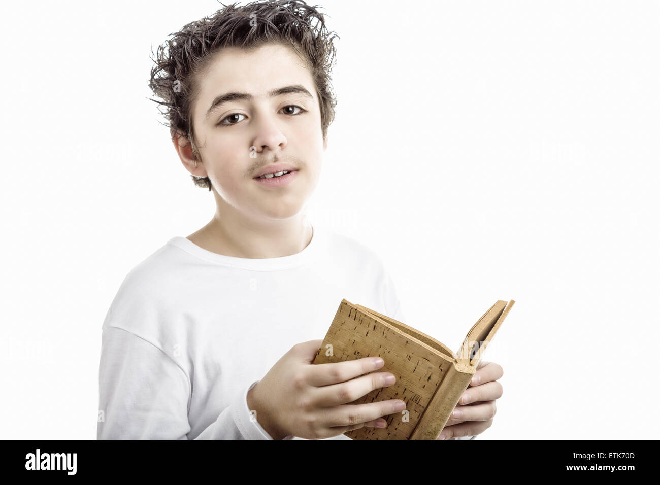 Hispanic boy reading book hi-res stock photography and images - Alamy