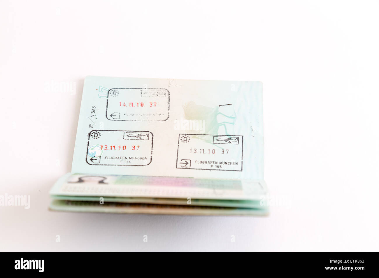 Visa and customs stamps in passports Stock Photo - Alamy