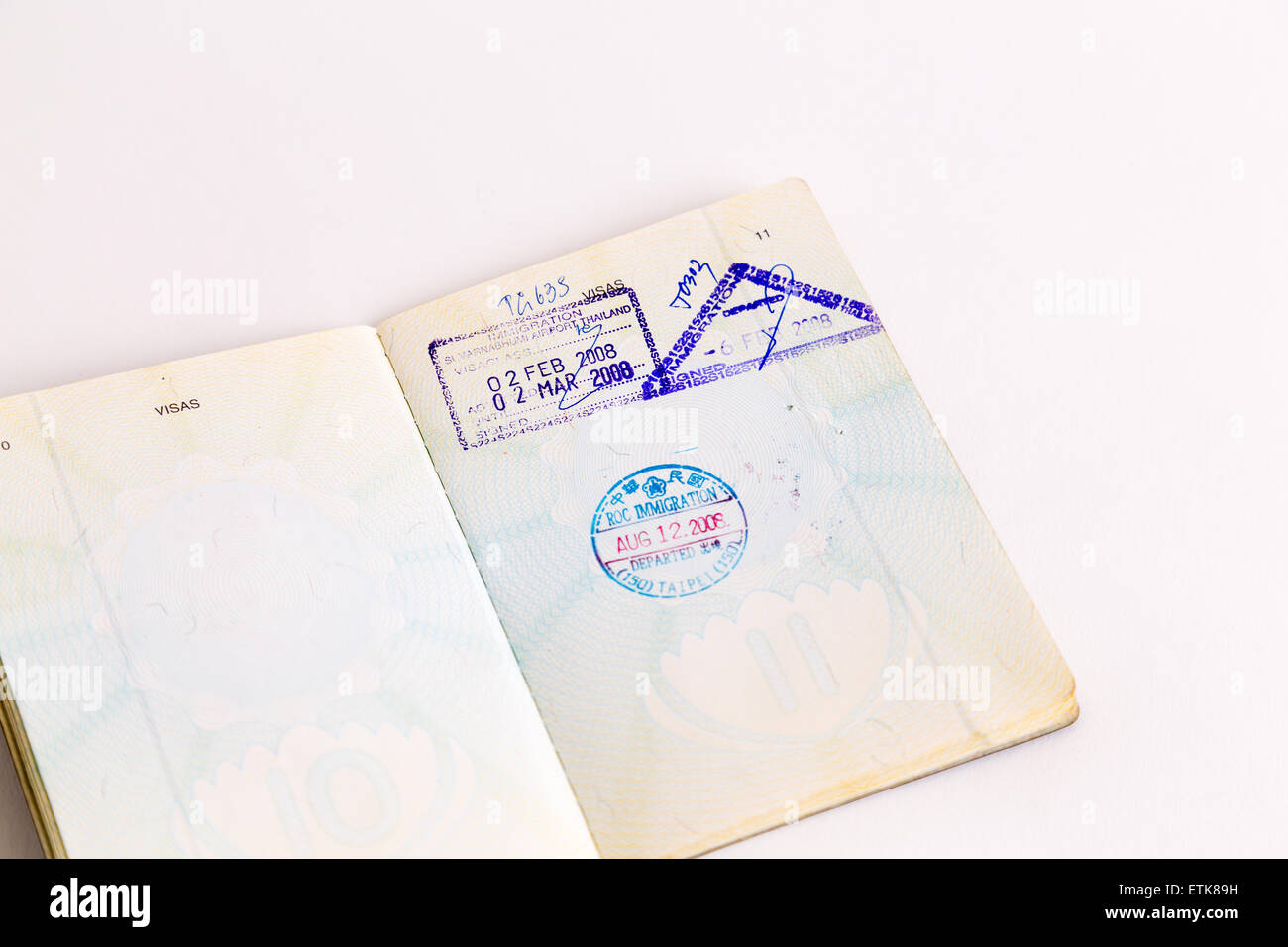 Visa and customs stamps in passports Stock Photo - Alamy
