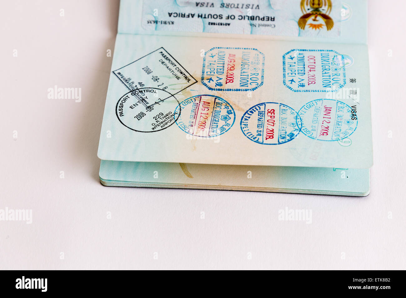Visa and customs stamps in passports Stock Photo - Alamy