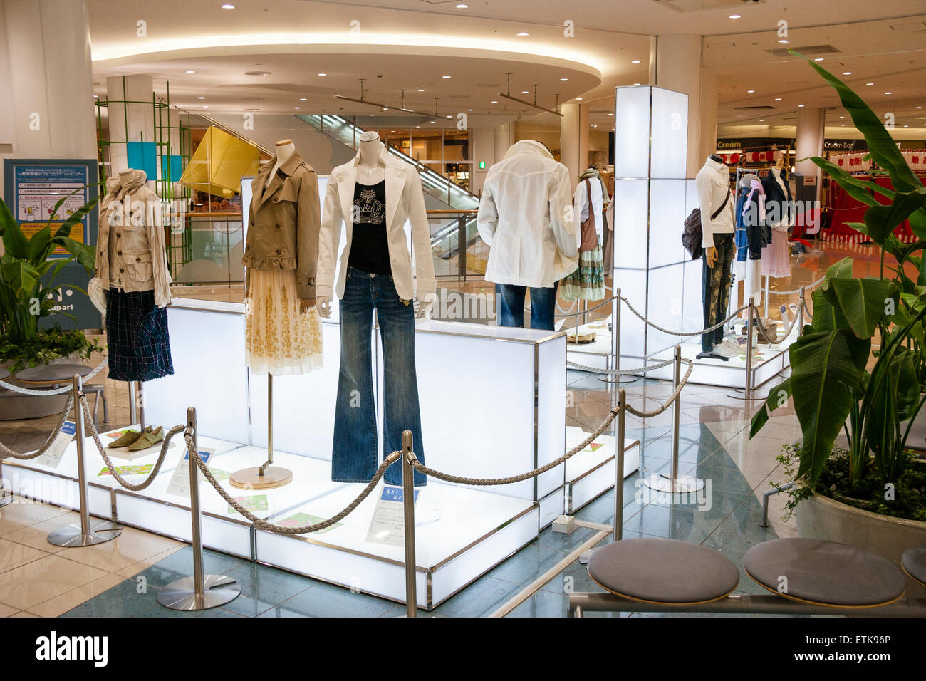 Japan, Nishinomiya. Interior of a modern shopping mall. Display of ...