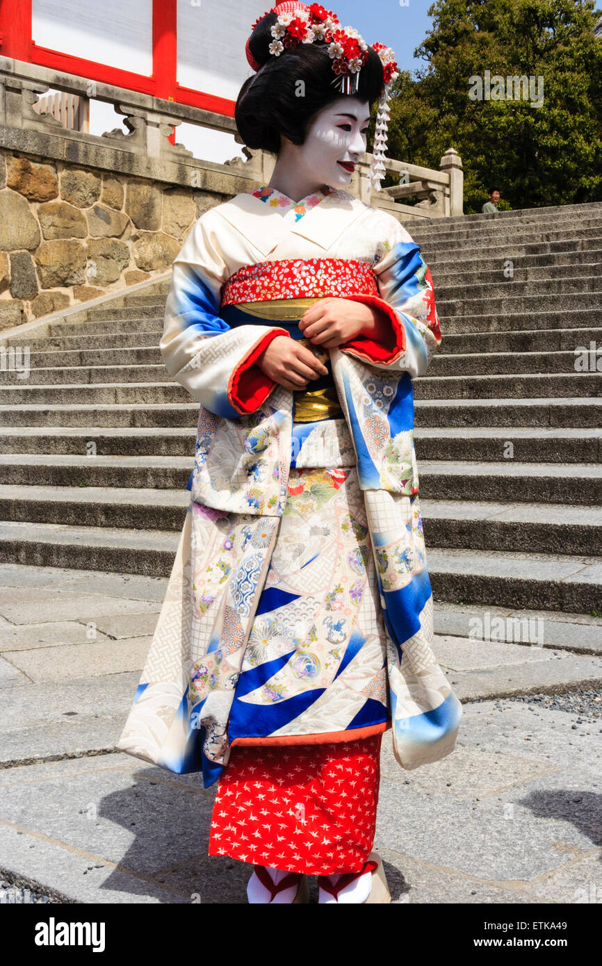 Japanese woman, a Geisha, AKA maiko, standing by steps at the Kiyomizu ...