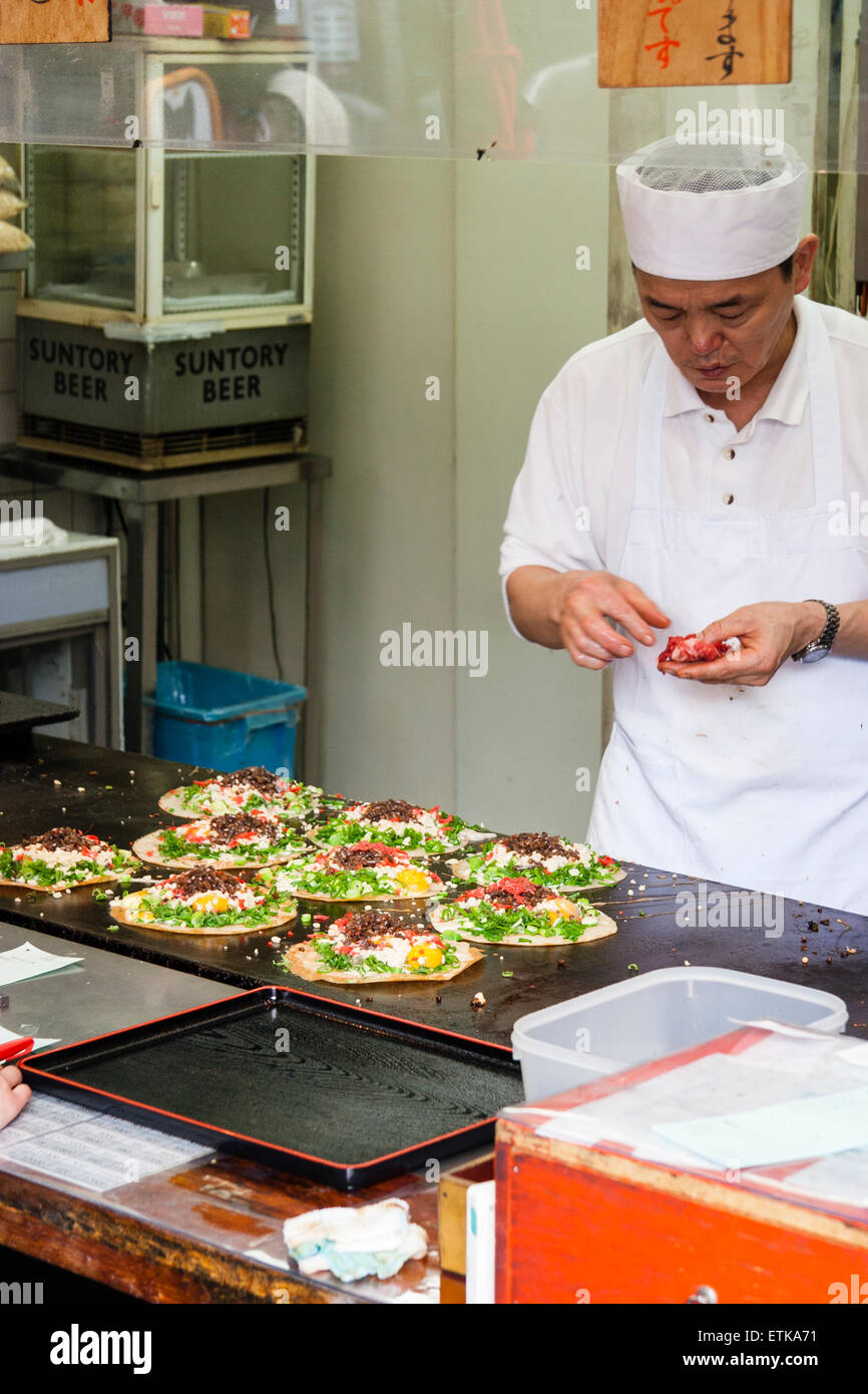 The famous okonomiyaki restaurant, Issen Yoshoku, in Gion, Kyoto, Chef ...