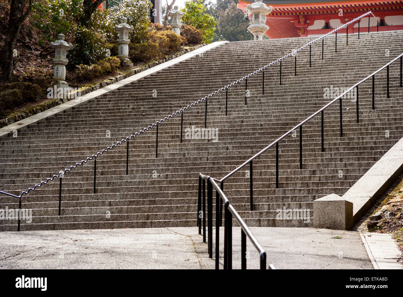Enryaku-ji temple in Kyoto. Very wide stone steps with railings leading ...