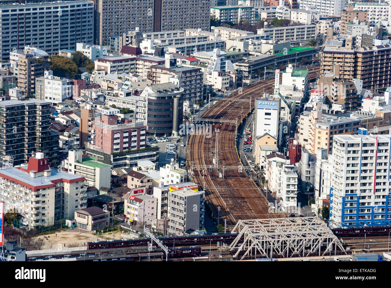 Aerial view of Osaka from the Umeda Sky Building. Main railway lines ...