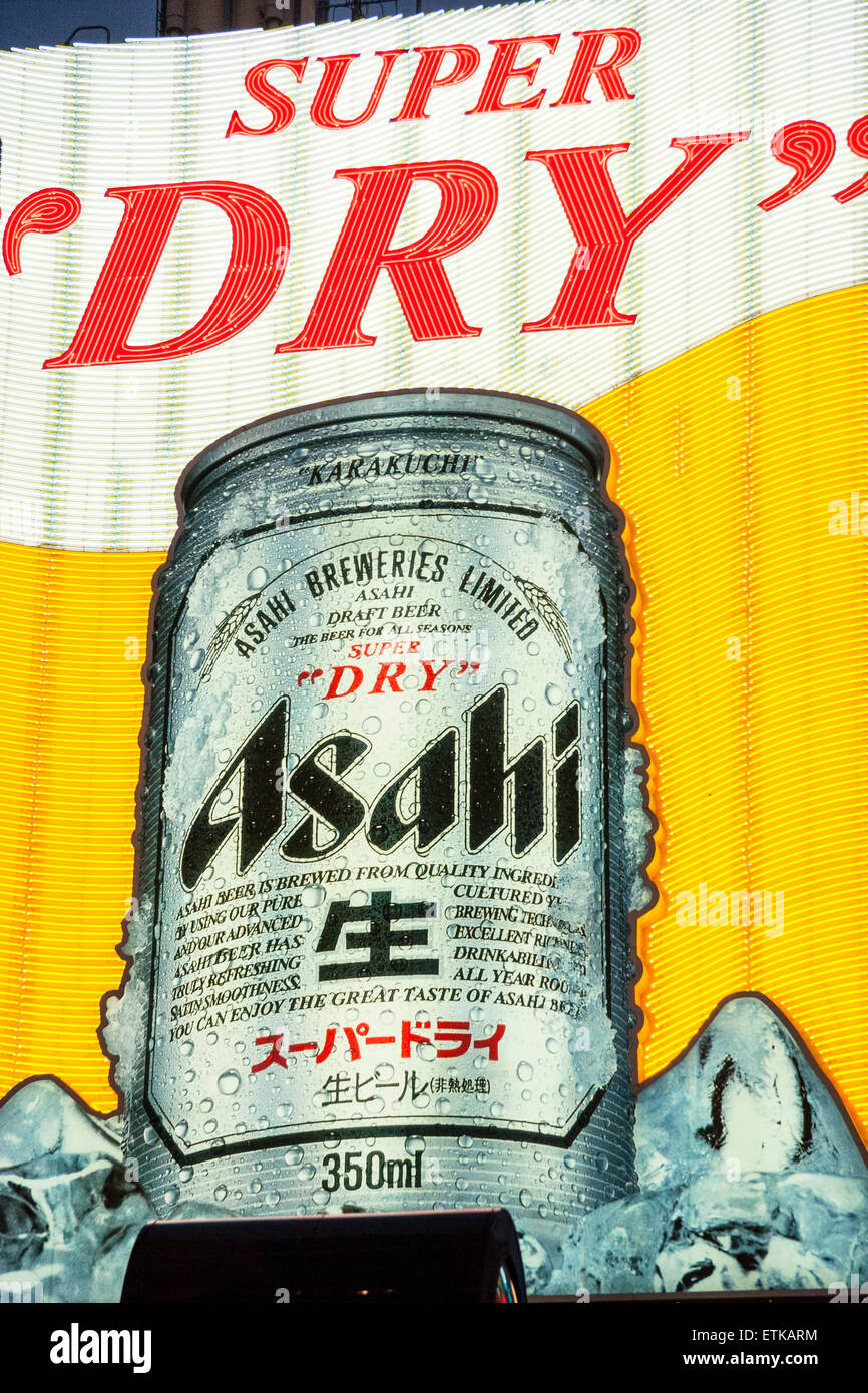 The famous neon Asahi beer sign, illuminated at night in Dotonbori ...