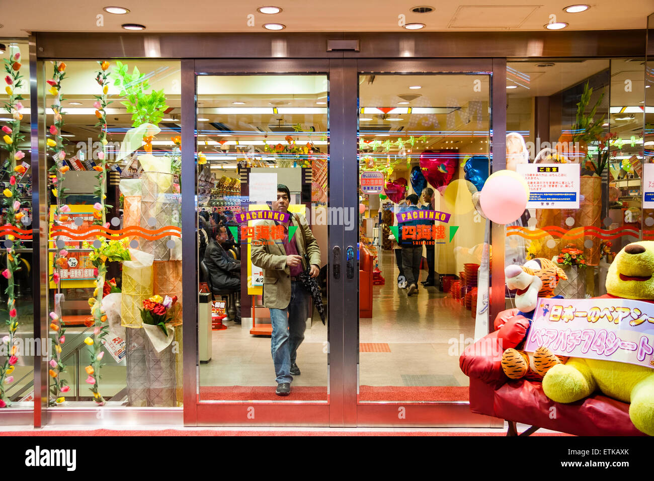 Japan, Osaka, Dotonbori. Pachinko parlor. View through glass door ...