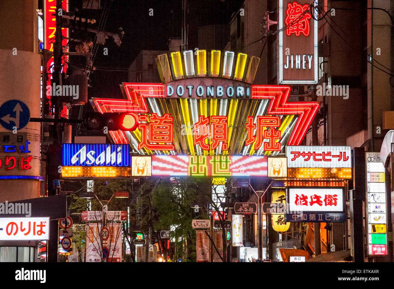 Japan, Osaka, Dotonbori. View along street at night time with ...