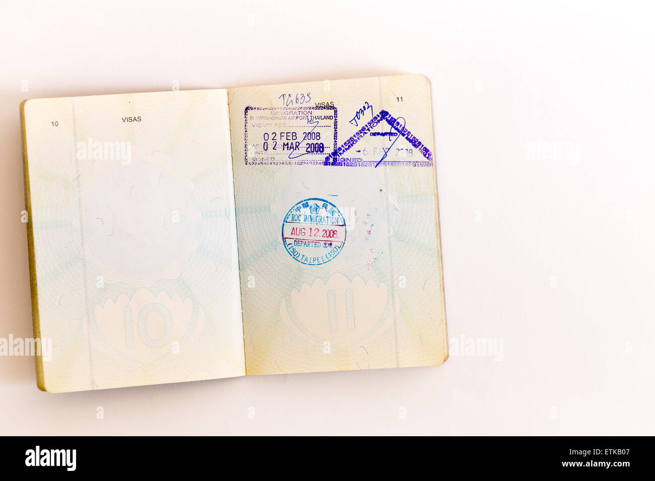 Visa and customs stamps in passports Stock Photo - Alamy