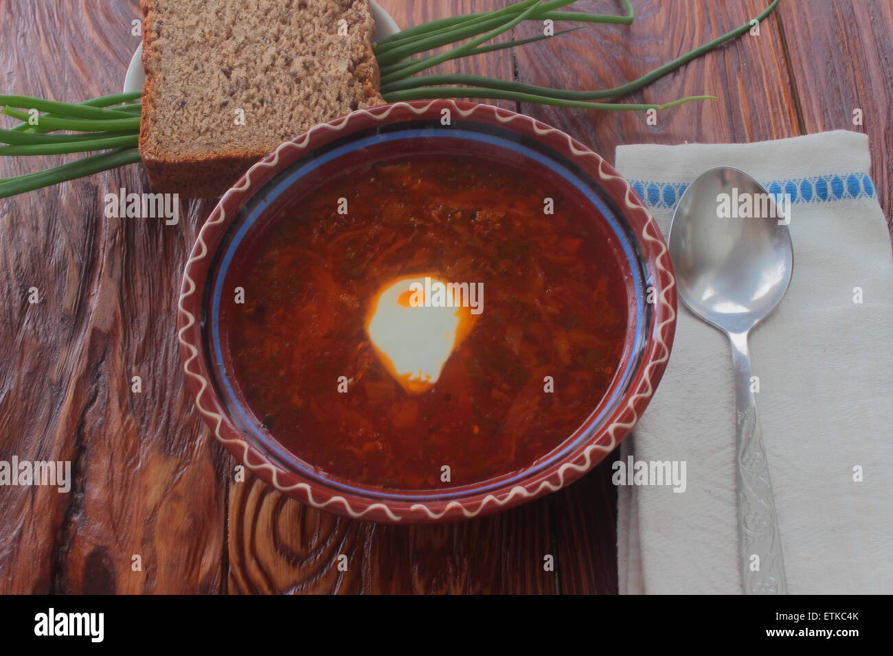 Lunch in the form of Ukrainian borsch with bread and chives Stock Photo ...