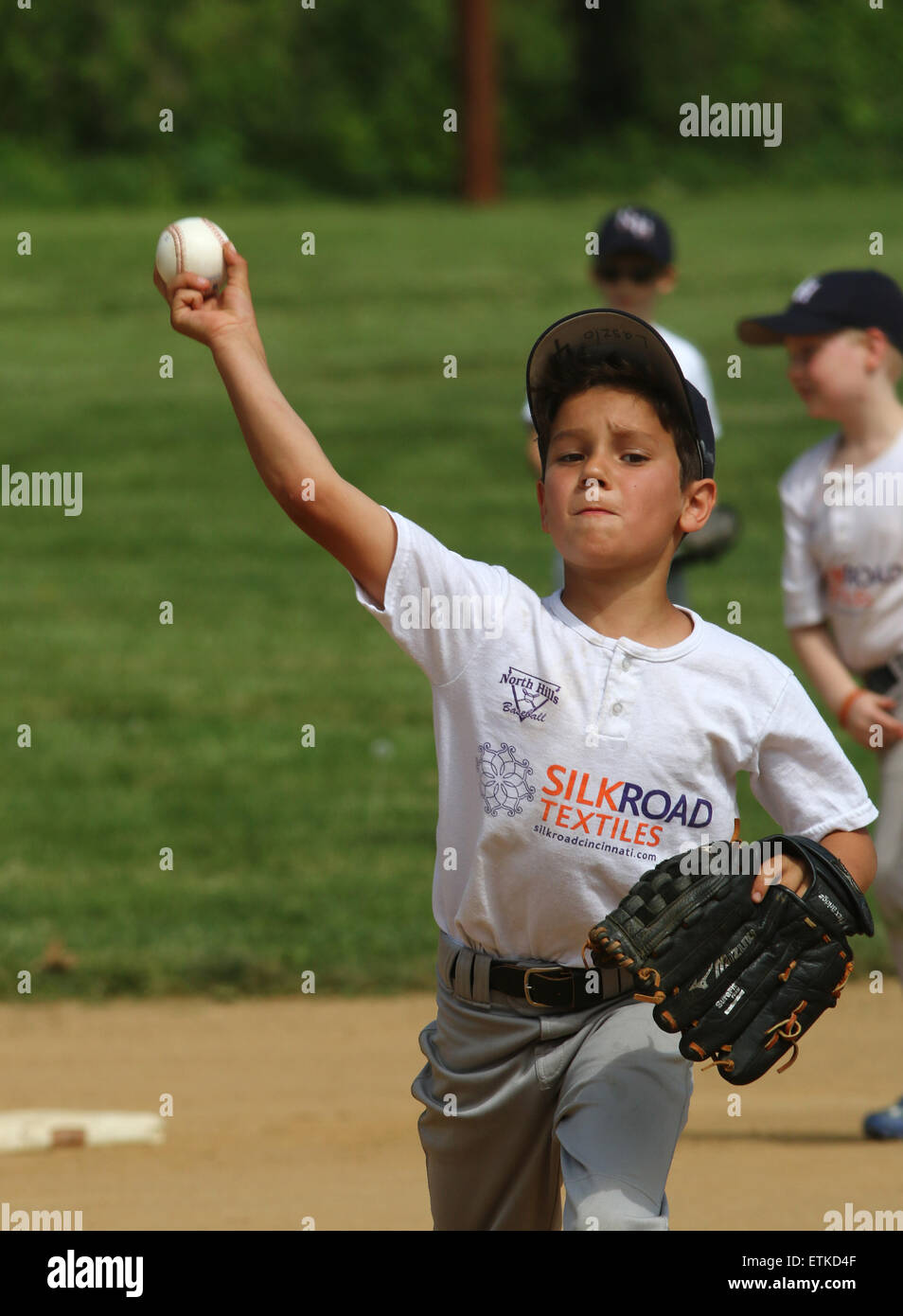 Little league baseball game boy hi-res stock photography and images - Alamy
