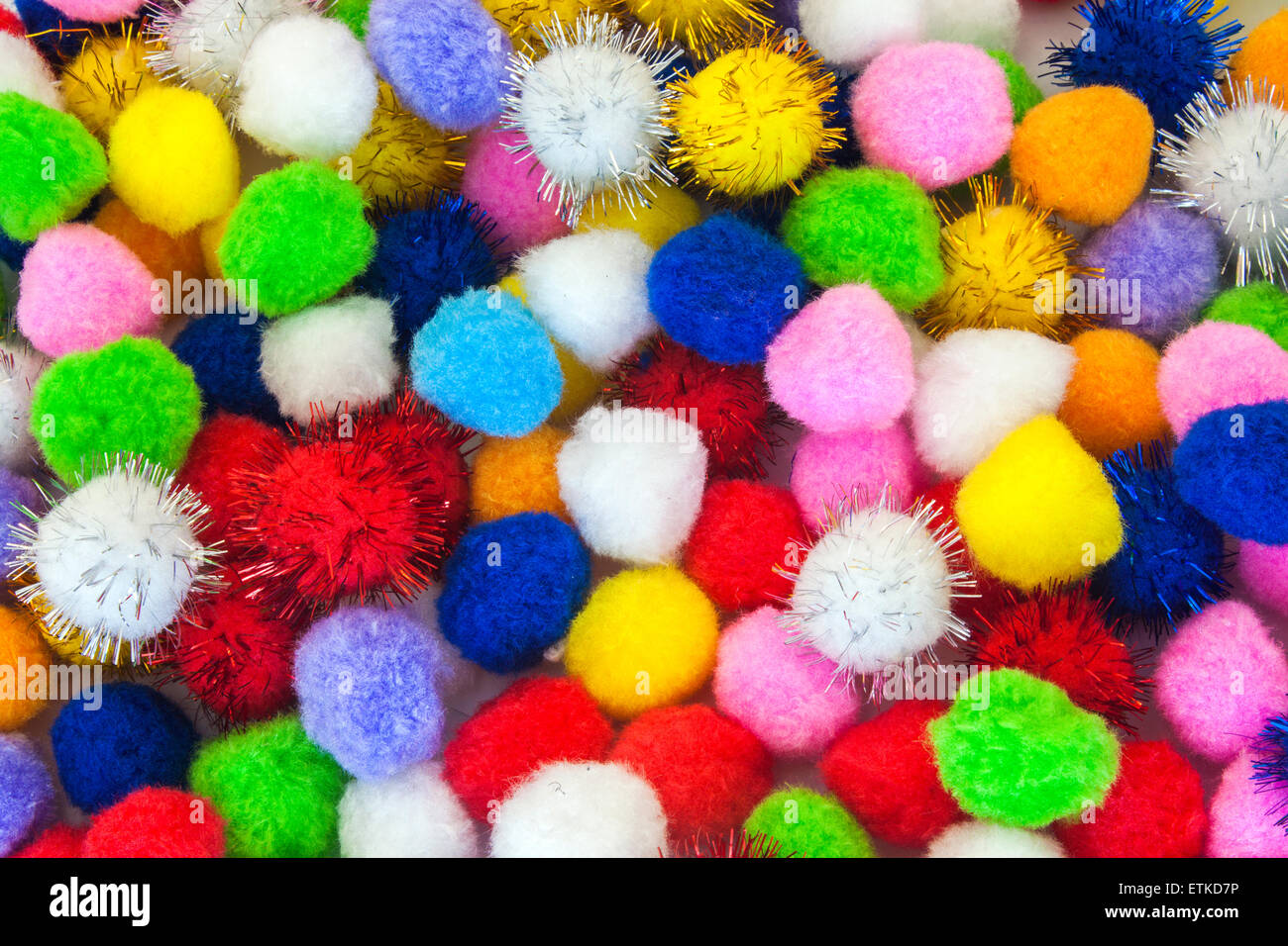 set of different colours and shapes of pompoms Stock Photo - Alamy