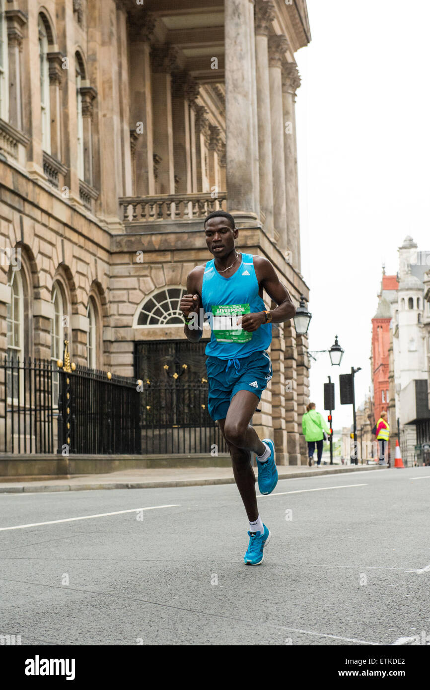 Liverpool, UK. 14th June, 2015. Runners run on the Liverpool's Streets ...