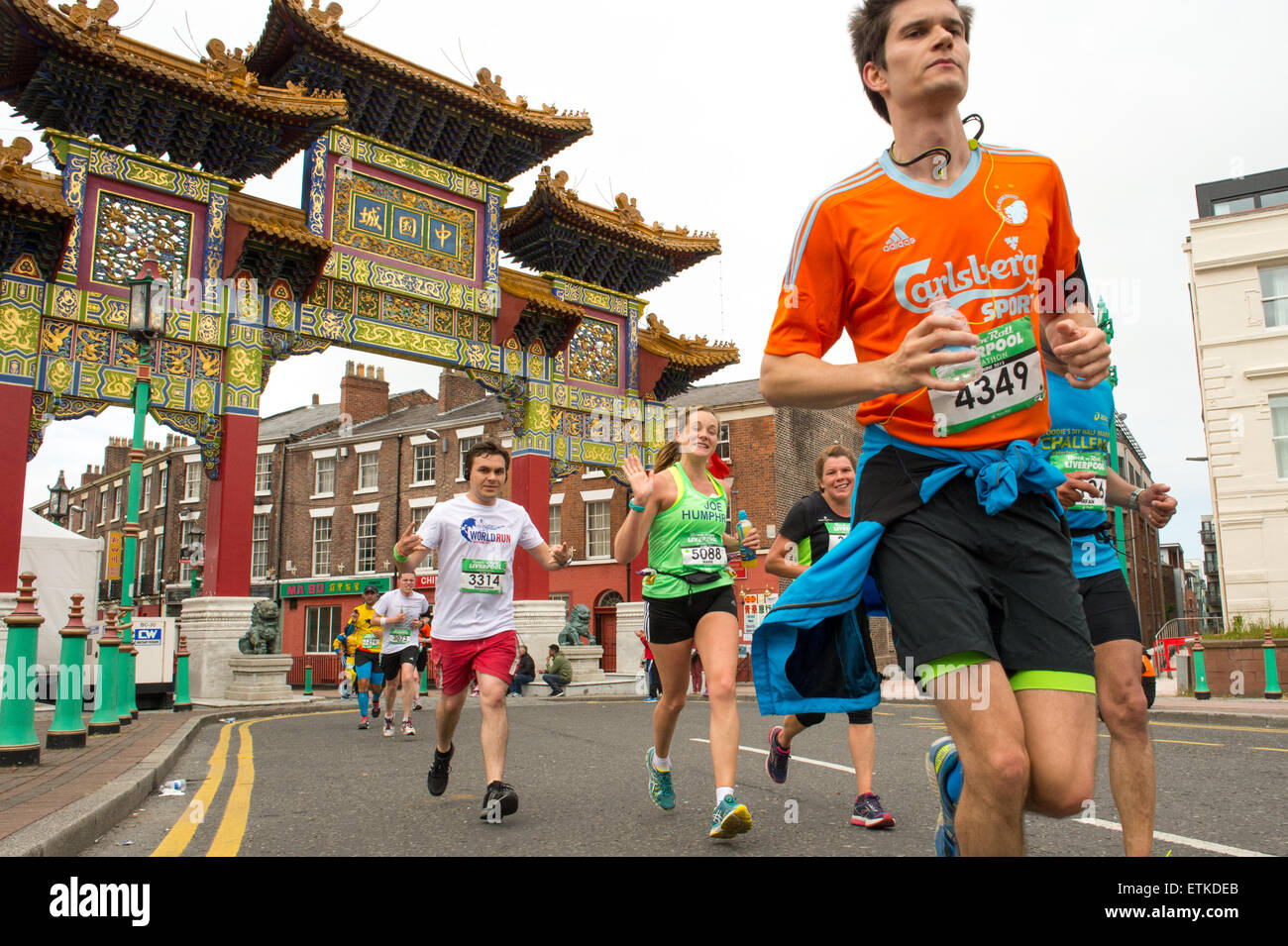 Liverpool, UK. 14th June, 2015. Runners run on the Liverpool's Streets ...