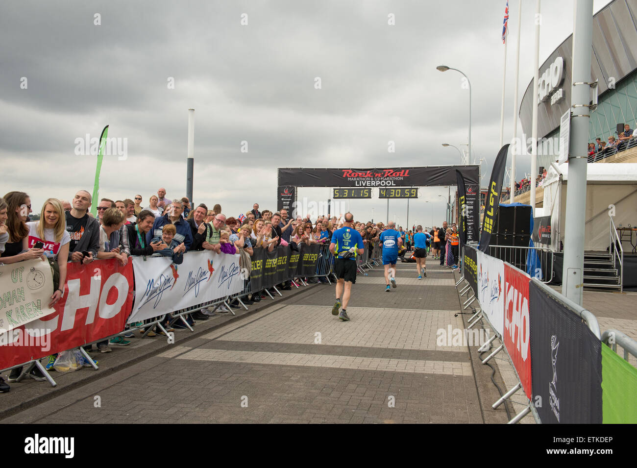 Liverpool, UK. 14th June, 2015. Runners run on the Liverpool's Streets ...