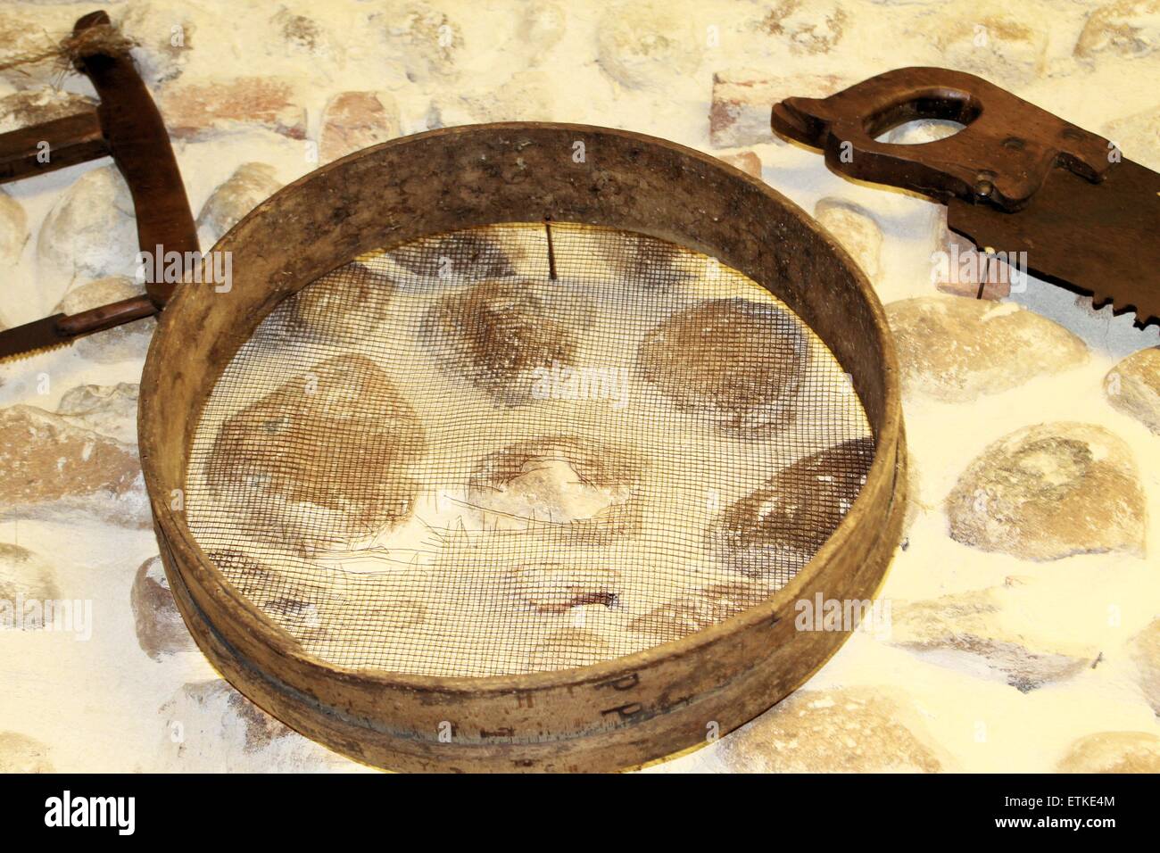 old wooden sieve on the wall Stock Photo - Alamy