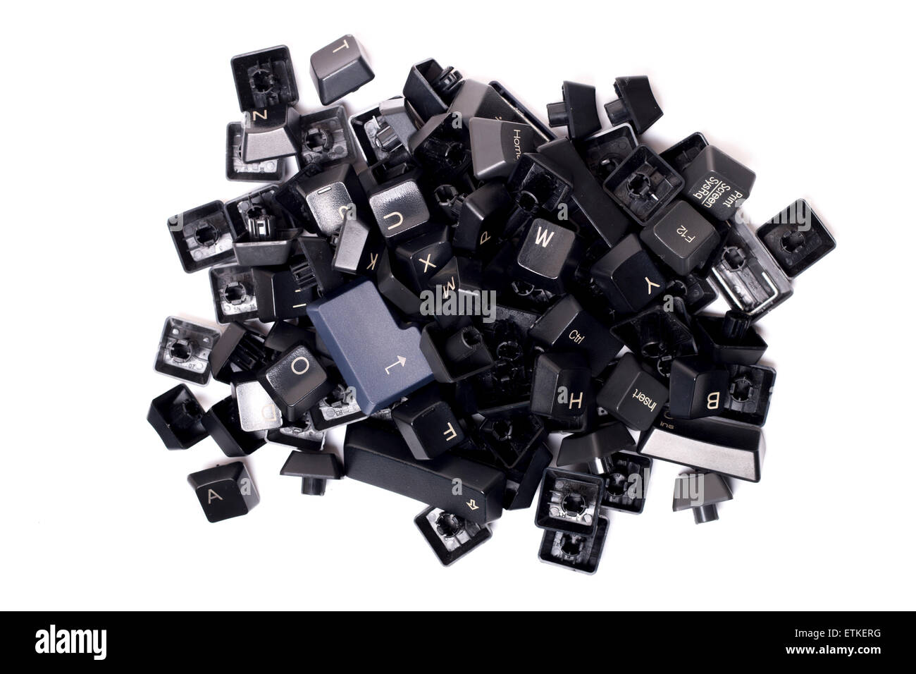 Pile of black computer keys on a white background Stock Photo - Alamy