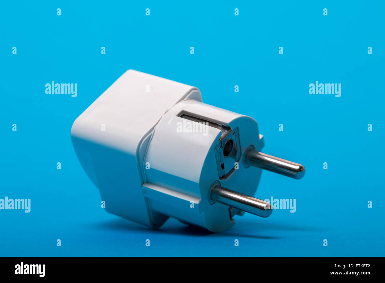 Close up view of an AC electric adapter from type g (UK) to type f ...