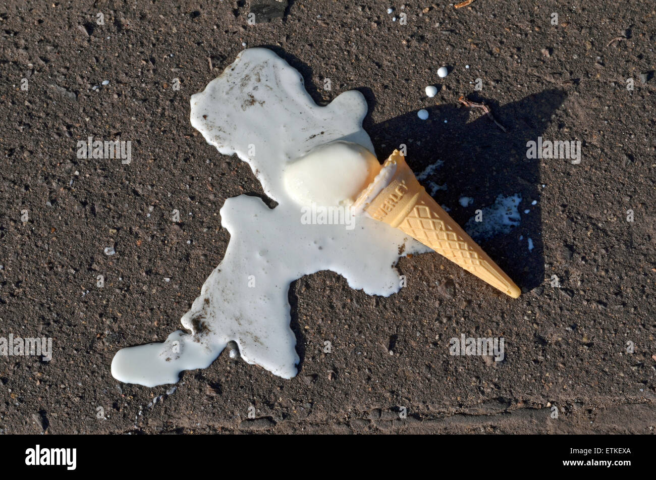 Melted cone on the pavement Stock Photo - Alamy