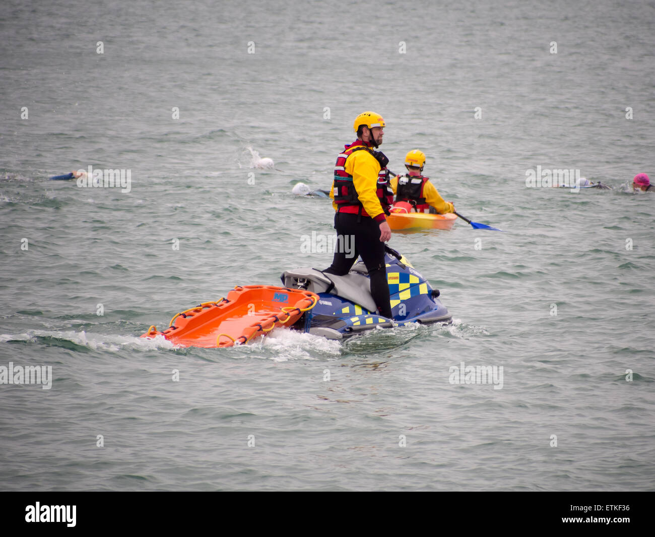 Lifeguards from the Royal Life Saving Society patrol the sea off ...