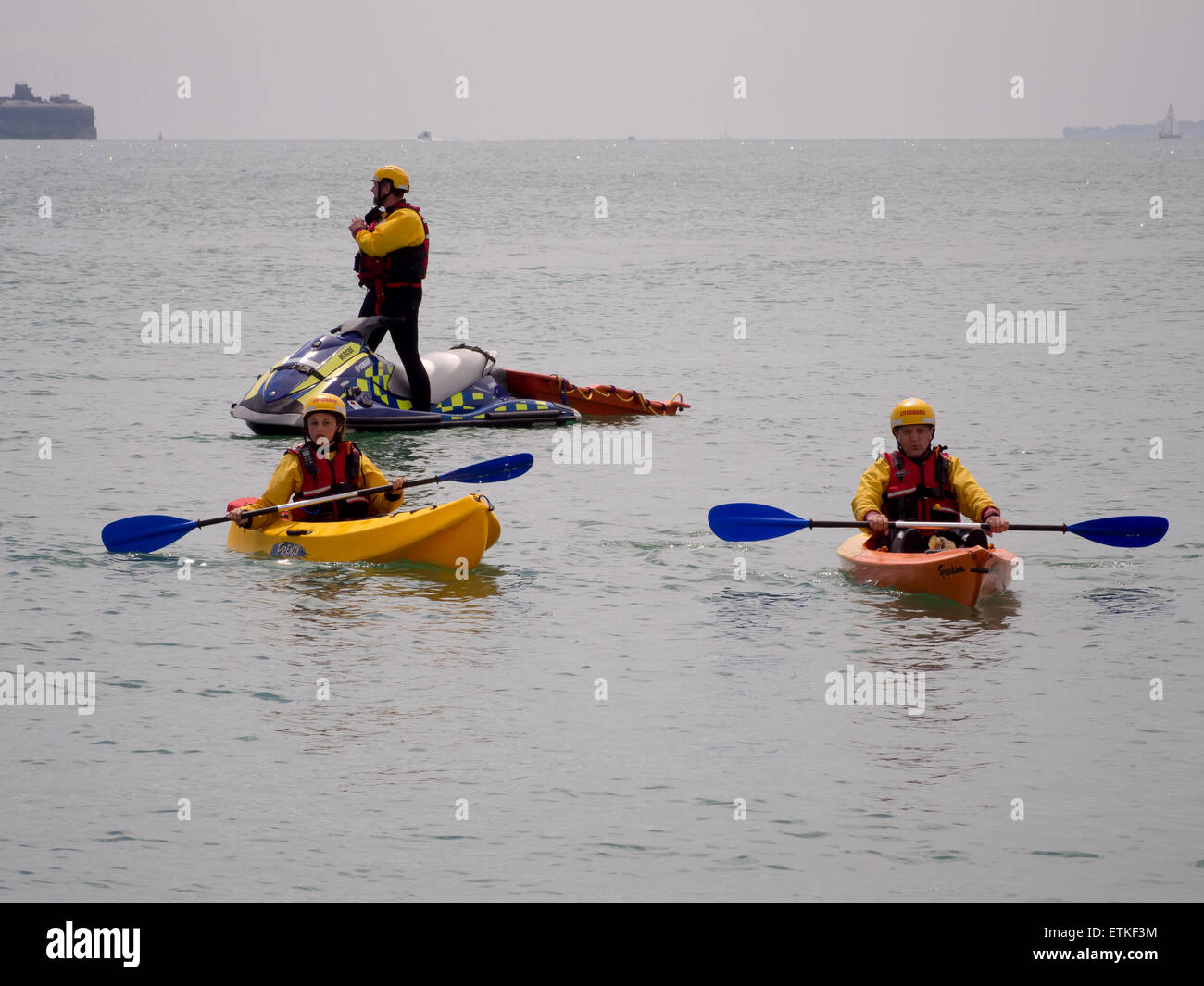 Lifeguards from the Royal Life Saving Society patrol the sea off ...