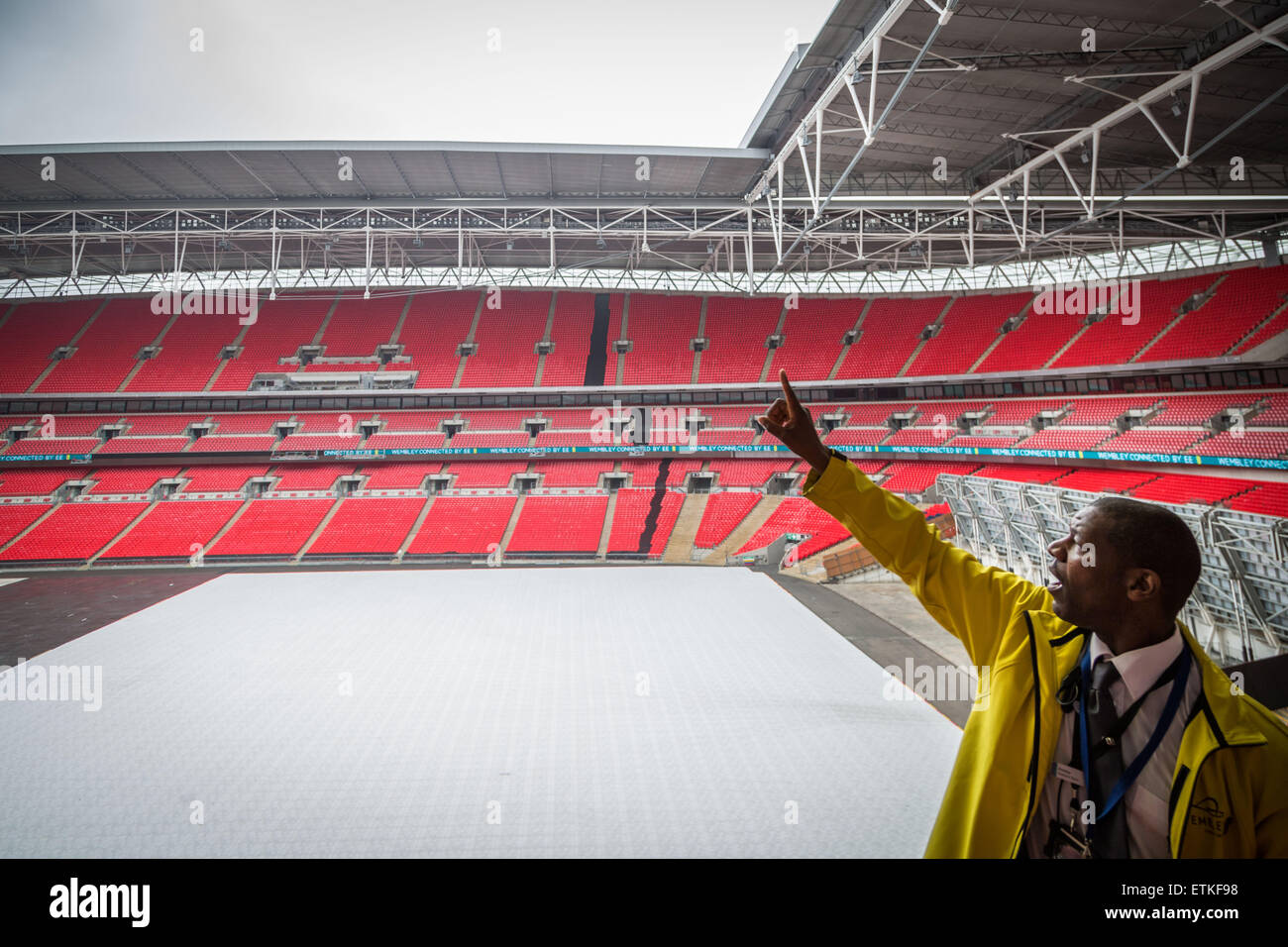 Wembley Stadium tour guide explains the interior Stock Photo - Alamy