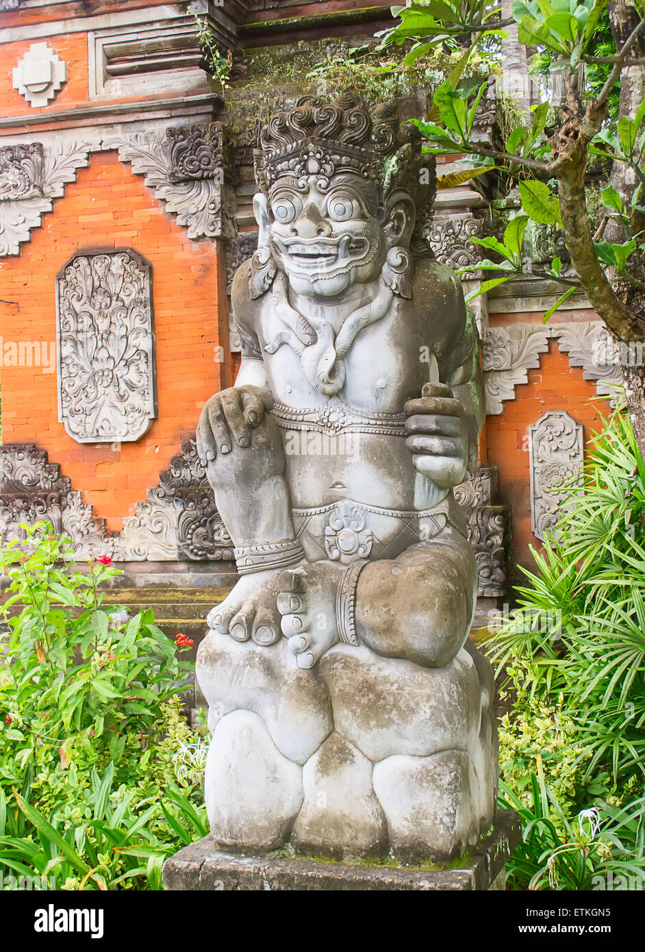 Traditional balinese sculpture near entrance to the temple Stock Photo ...