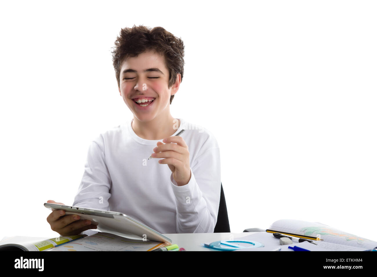Caucasian latin young boy doing his homework feels very happy and ...