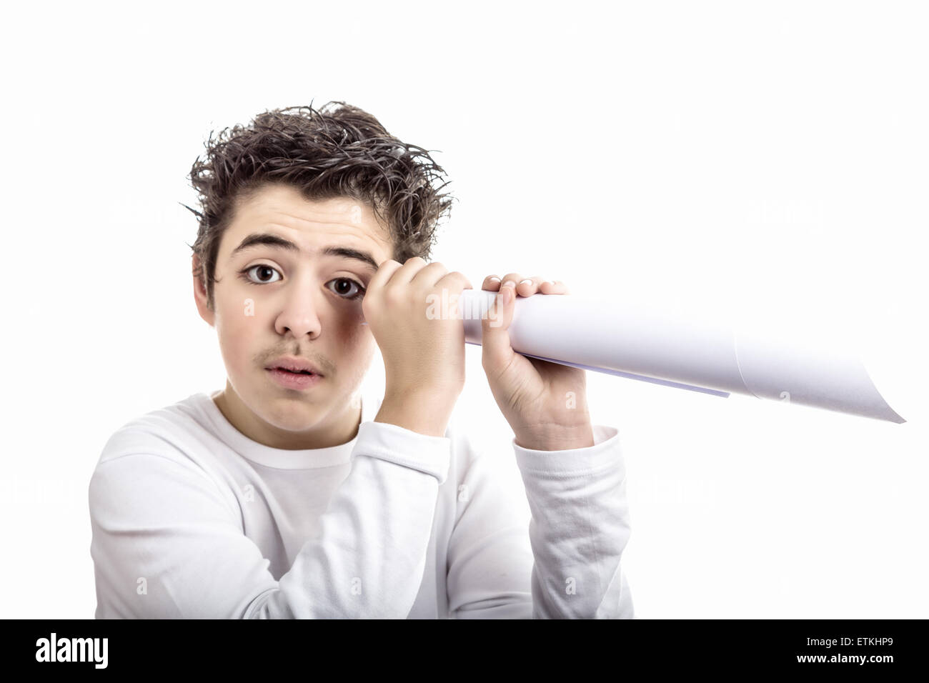 Handsome hispanic boy with questioning eyes is going to look in a fake ...