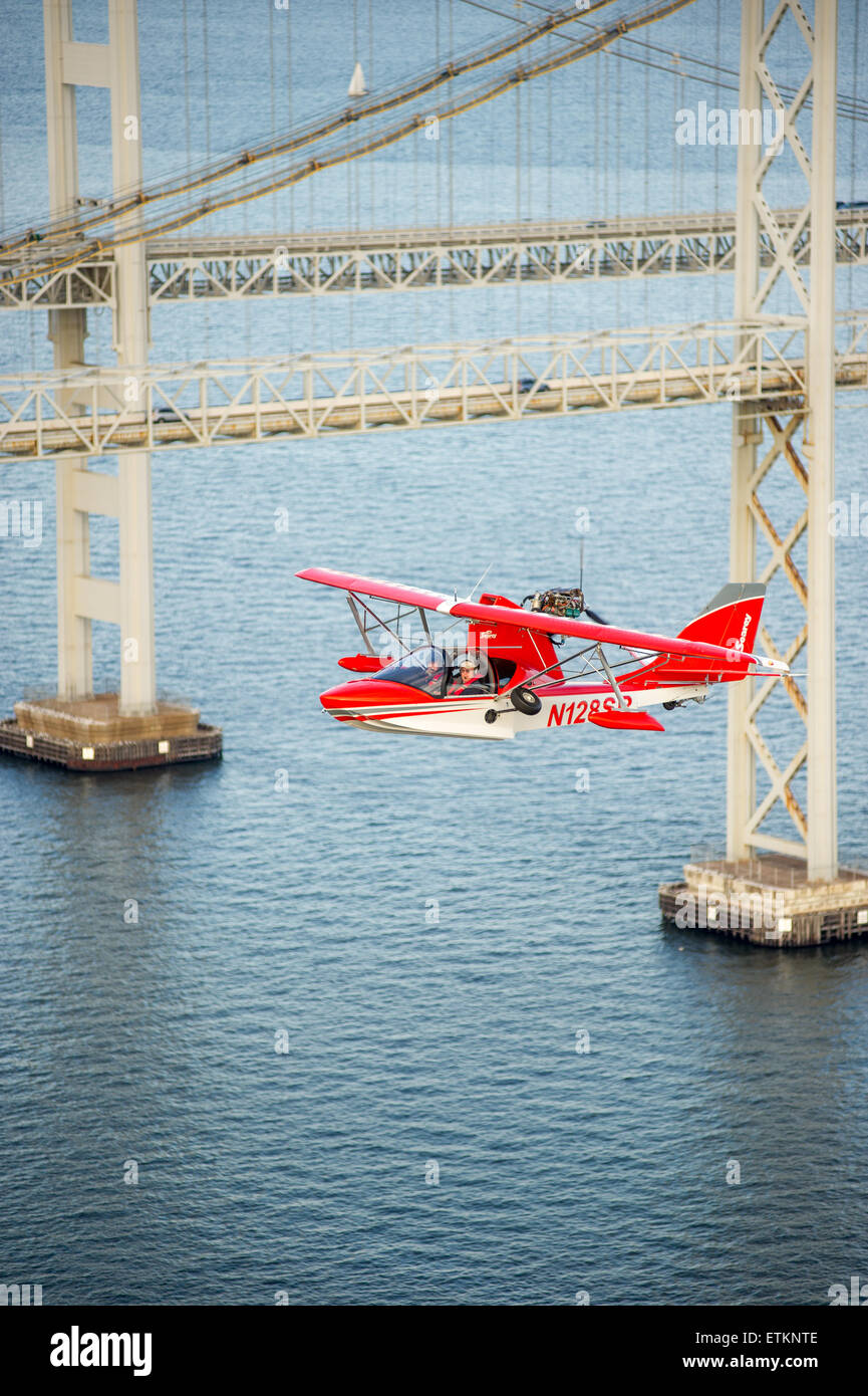 Searey a small seaplane flying near Chesapeake Bay Bridge, Maryland ...