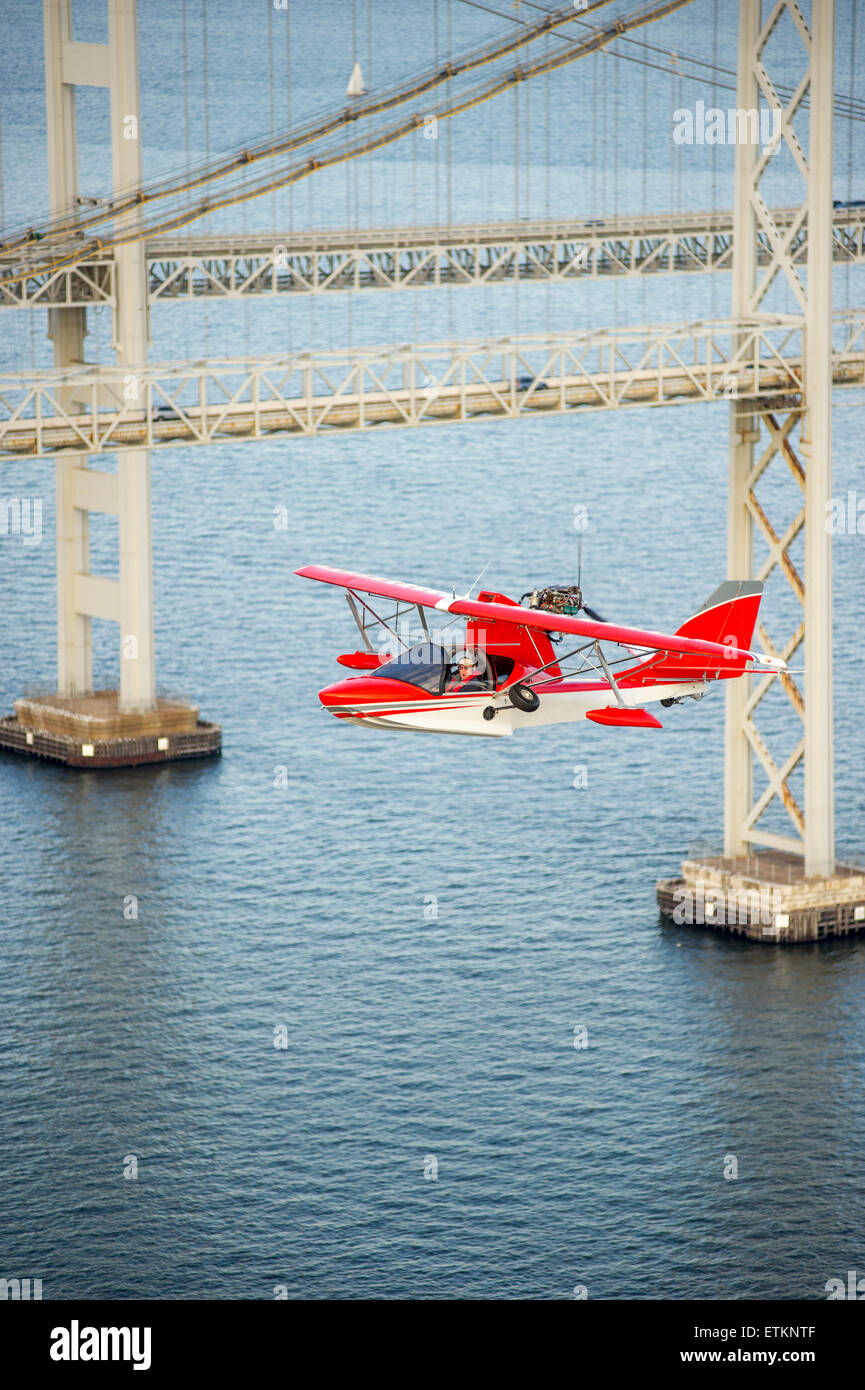 Searey a small seaplane flying near Chesapeake Bay Bridge, Maryland ...