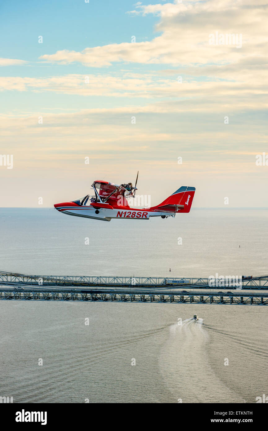 Searey a small seaplane flying near Chesapeake Bay Bridge, Maryland ...