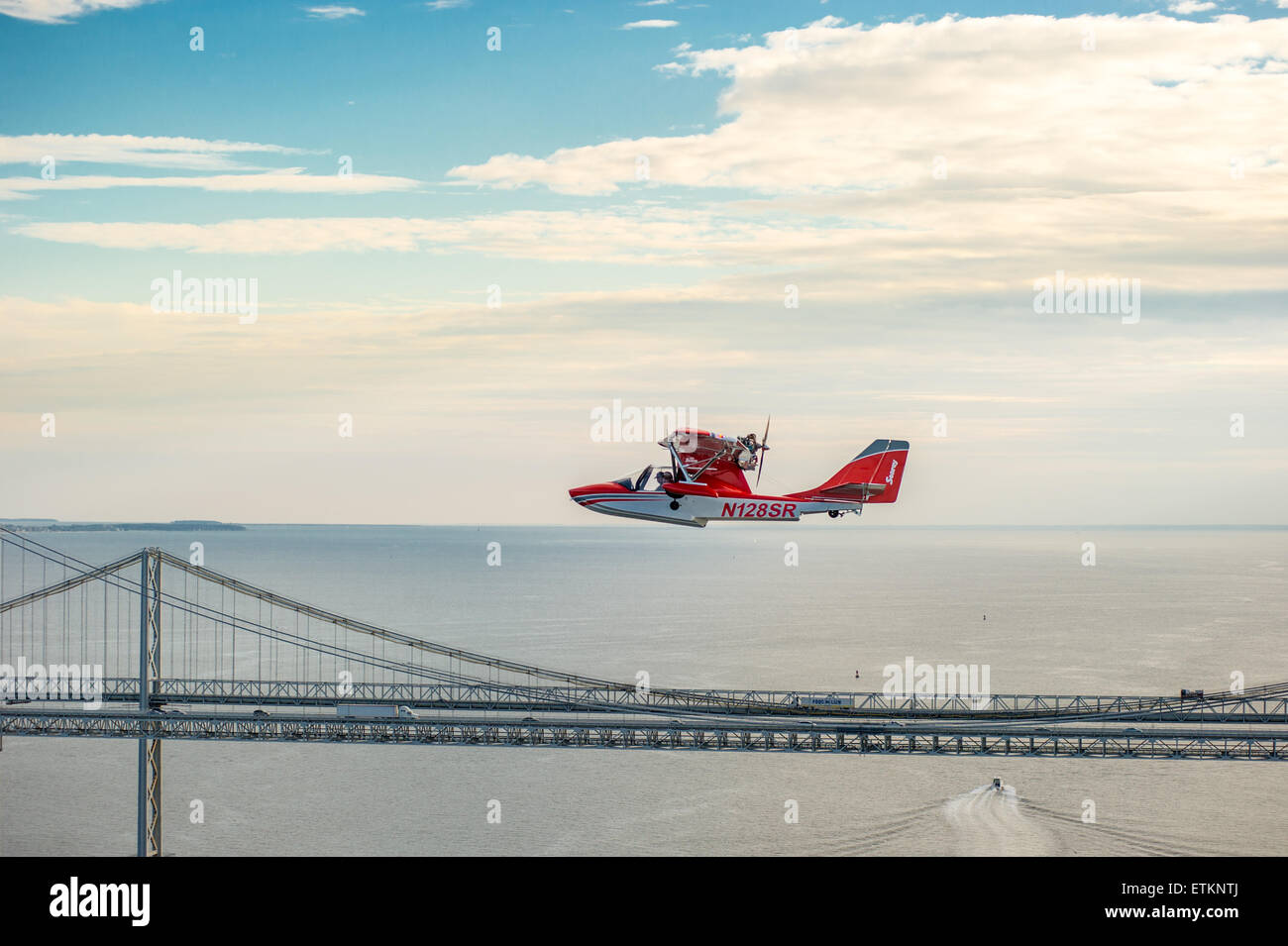 Searey a small seaplane flying near Chesapeake Bay Bridge, Maryland ...