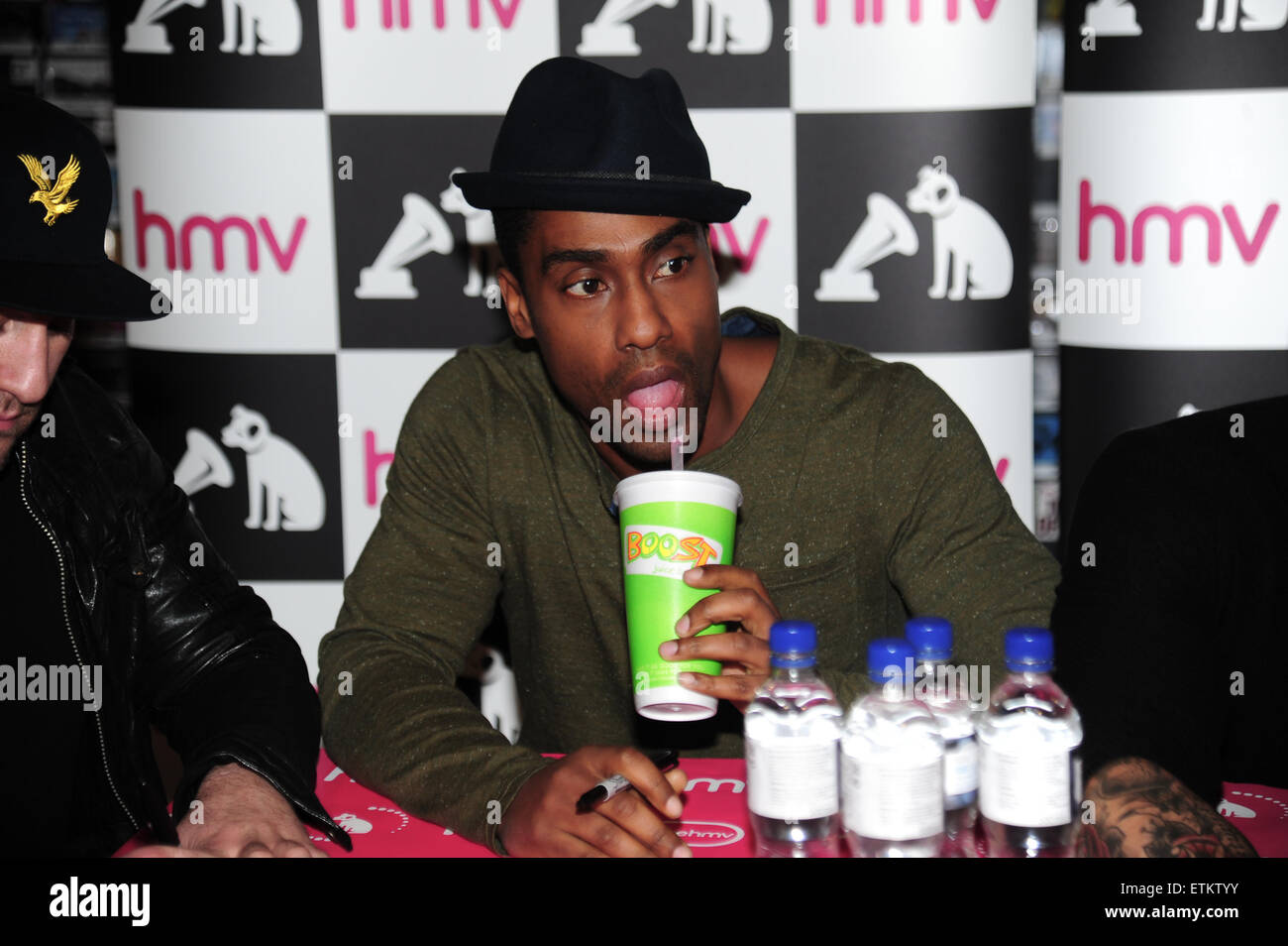 Blue sign copies of their new album 'Colours' at HMV in Birmingham ...