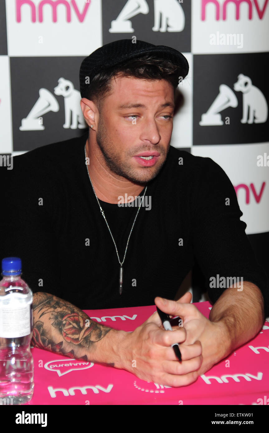 Blue sign copies of their new album 'Colours' at HMV in Birmingham ...