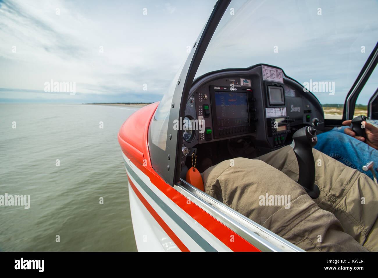 Instrument panel of seaplane while flying over water in Southeastern ...