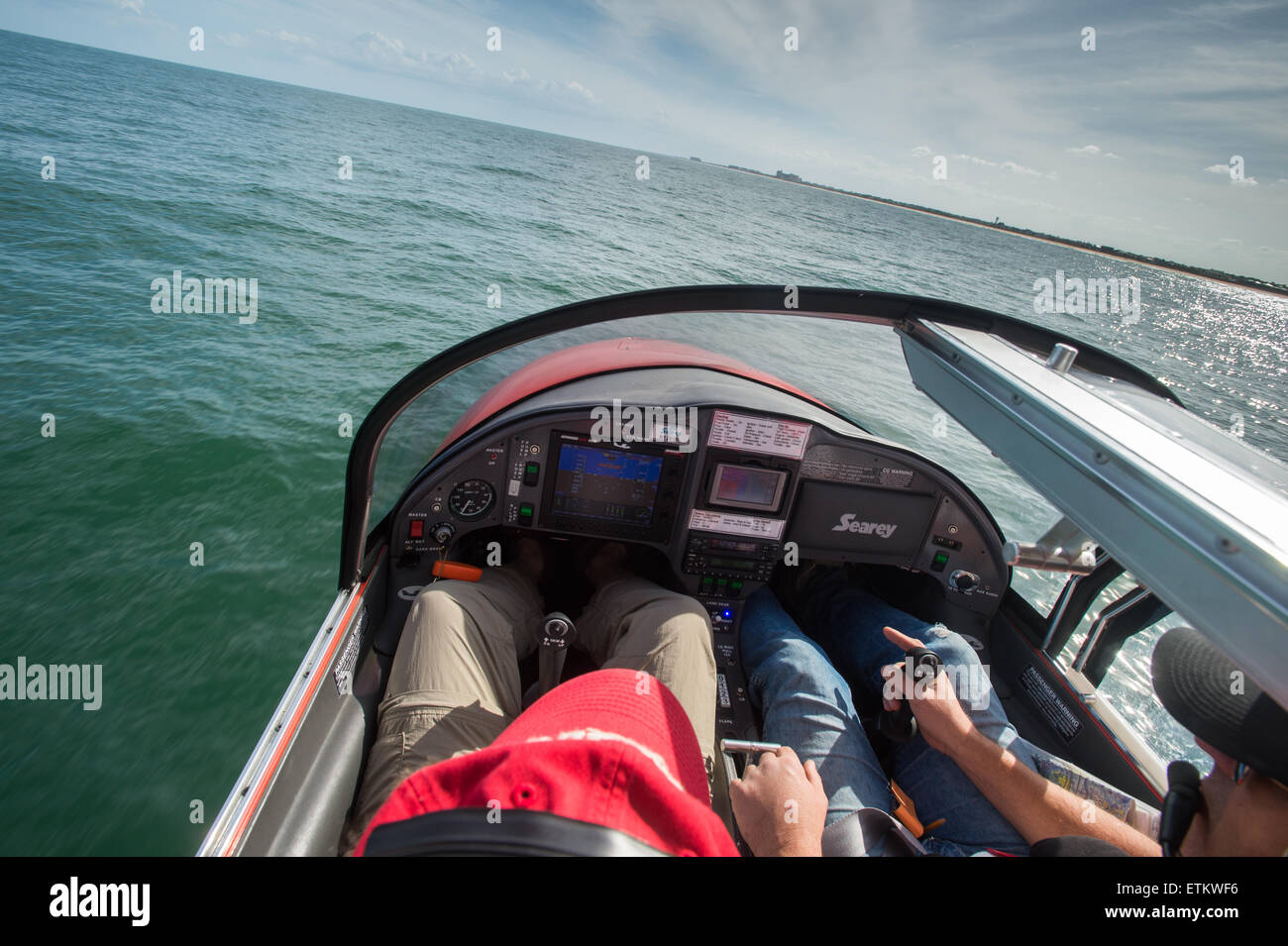Instrument panel of seaplane while flying over water in Southeastern ...