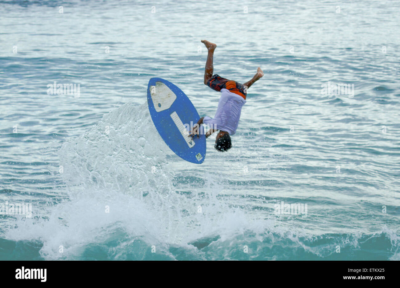 Philippines. 14th June, 2015. A surfer enthusiast enjoys the waves of ...