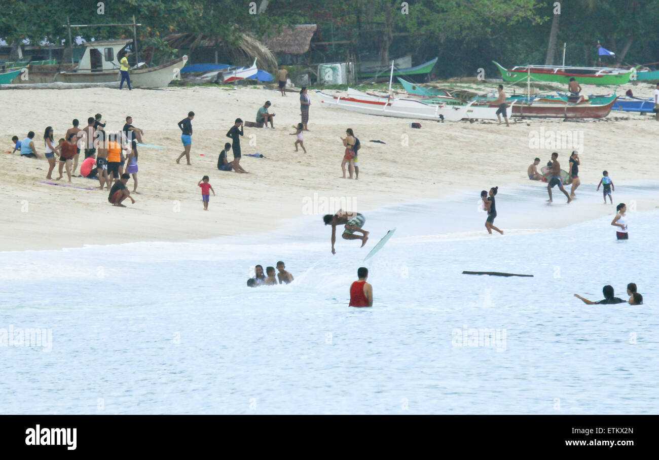 Philippines. 14th June, 2015. Beach goers enjoying at Dahican Beach ...