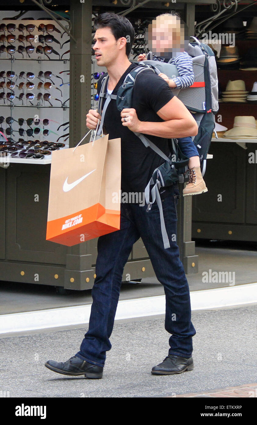 The Bold and the Beautiful soap actor, Adam Gregory carries his son ...